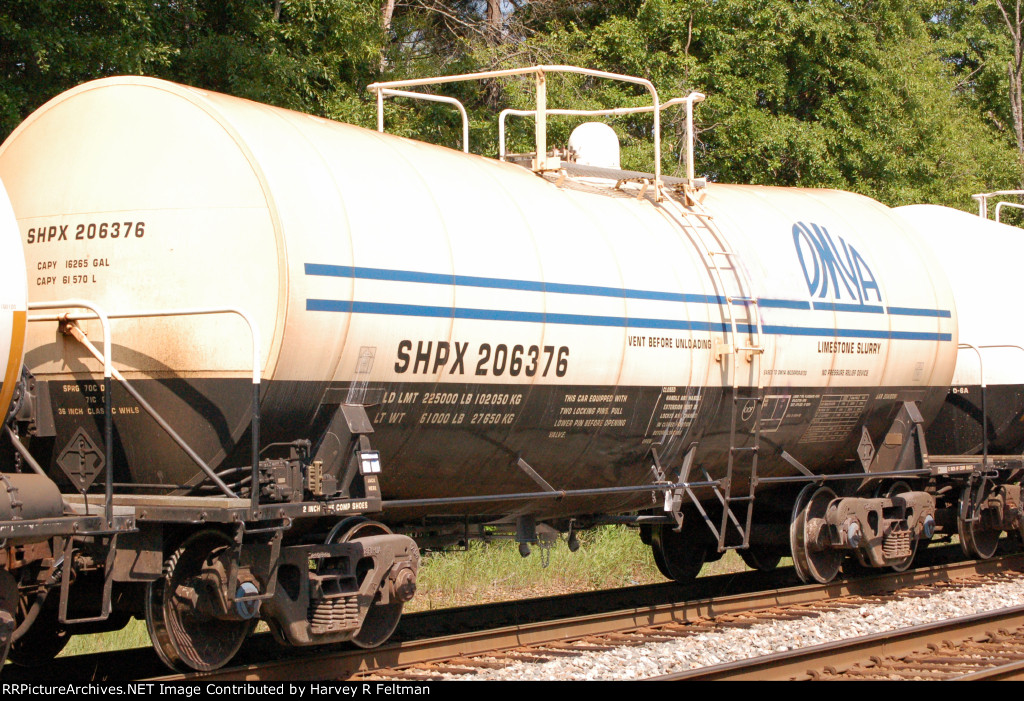 SHPX tank car #206376, built by American Car & Foundry and leased to OMYA for limestone slurry ...